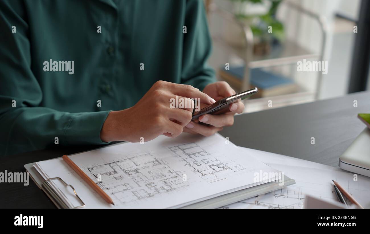 Architecture Man use smart phone for architectural Creative project ...
