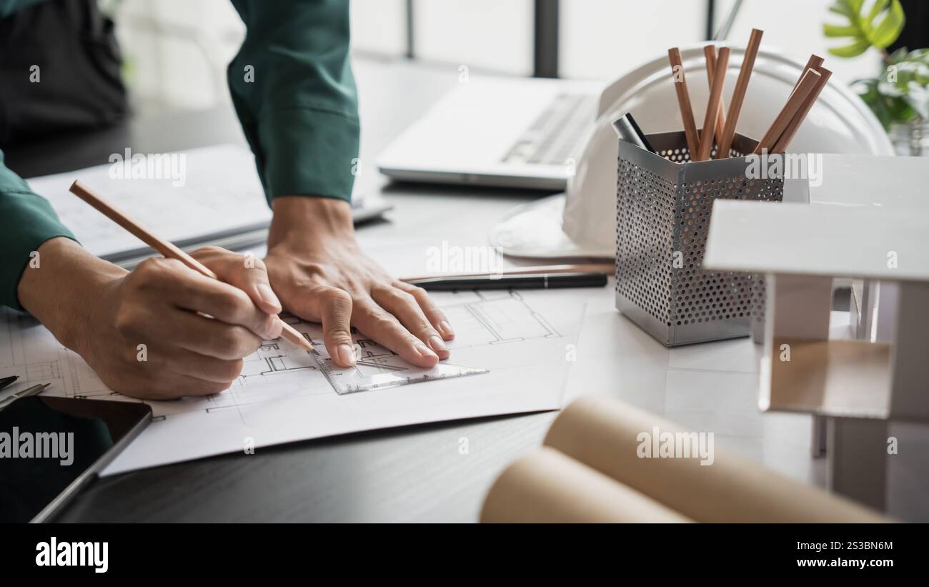 Green Eco Architecture Man drawing on architectural Creative project ...