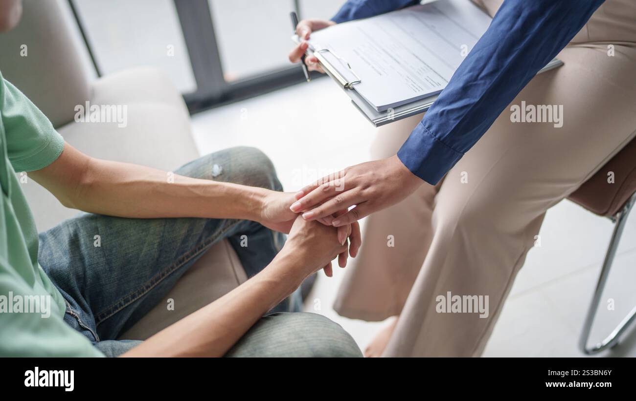 Professional psychotherapy Taking Note During Appointment Patient ...