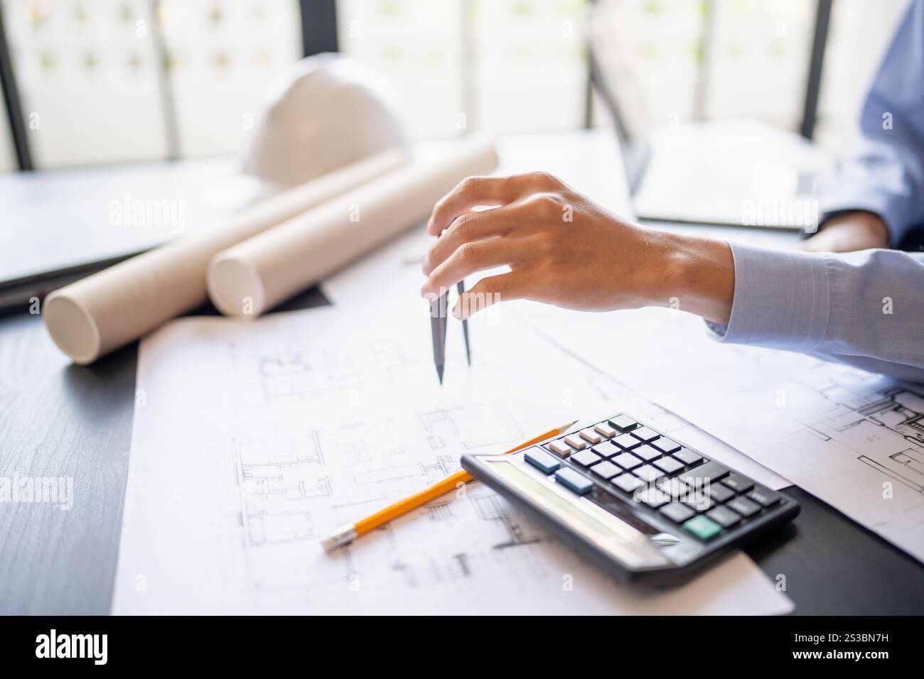 Architecture Man drawing on architectural Creative project business ...