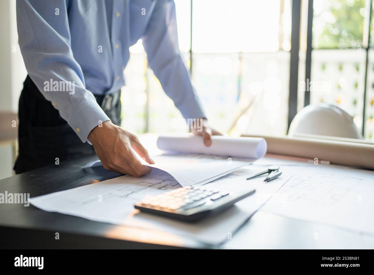 Architecture Man drawing on architectural Creative project business ...