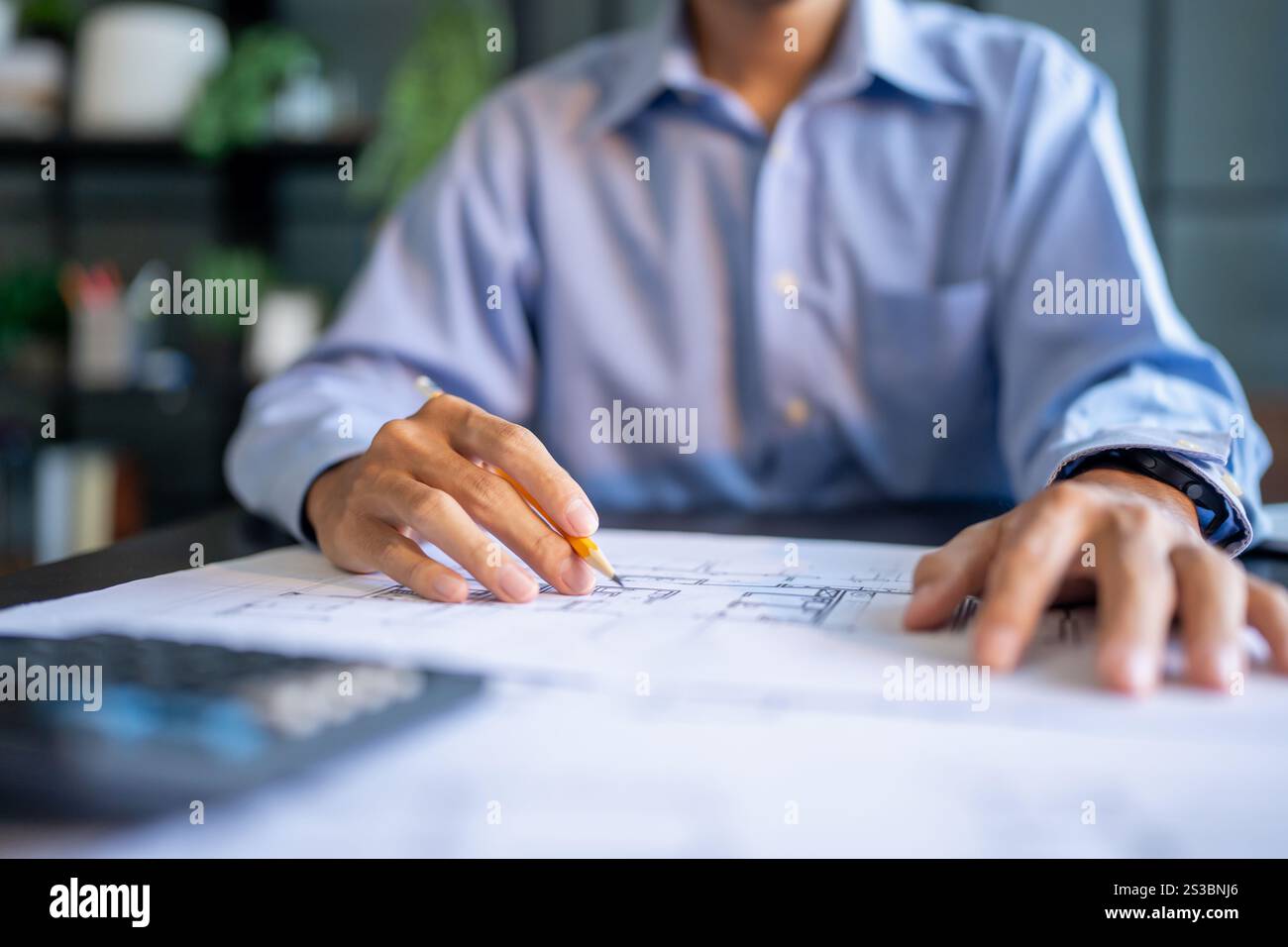 Architecture Man drawing on architectural Creative project business ...