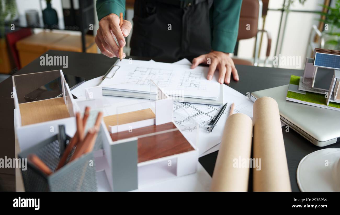 Green Eco Architecture Man drawing on architectural Creative project business architecture ...