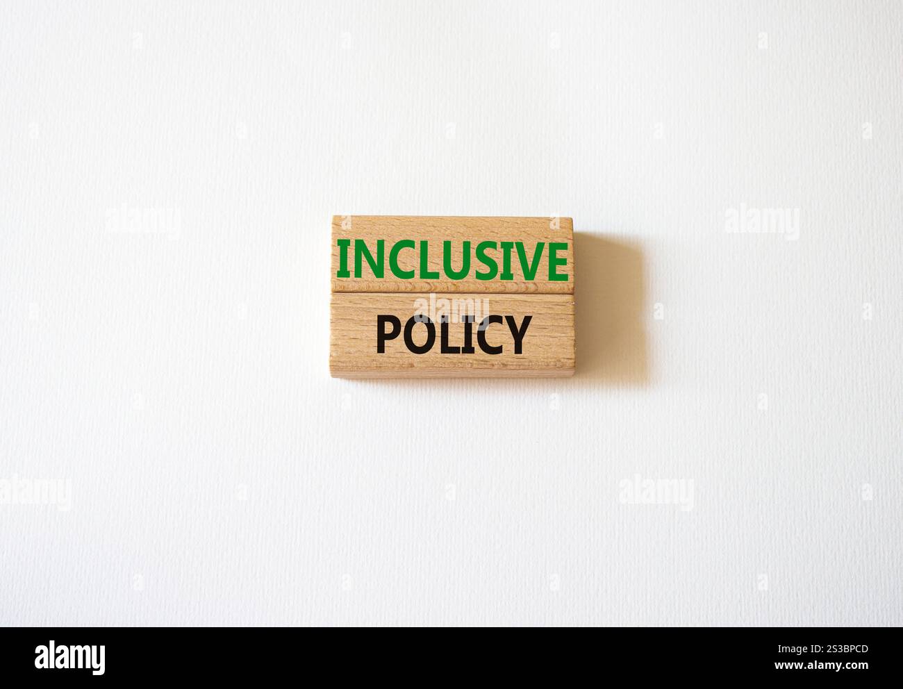 Inclusive policy symbol. Concept word Inclusive policy on wooden blocks ...