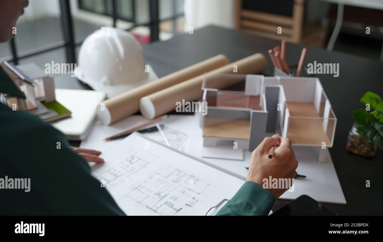 Architecture Man drawing on architectural Creative project business ...