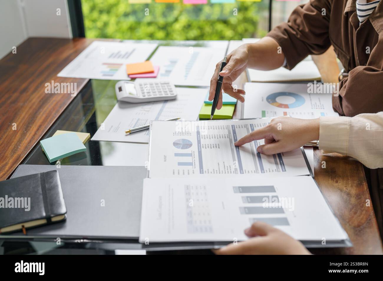 Business People brainstorming Meeting Design Ideas use post it notes to ...