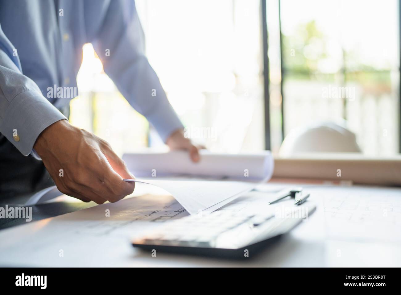 Architecture Man drawing on architectural Creative project business ...