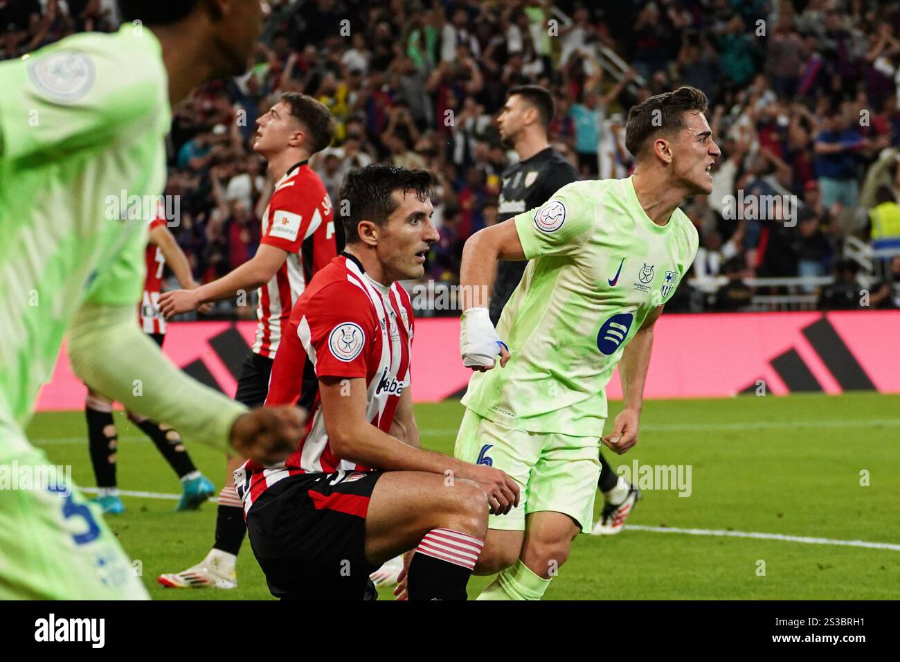 Jeddah, Saudi Arabia. 08th Jan, 2025. FC Barcelona's Pablo Gavi (R ...