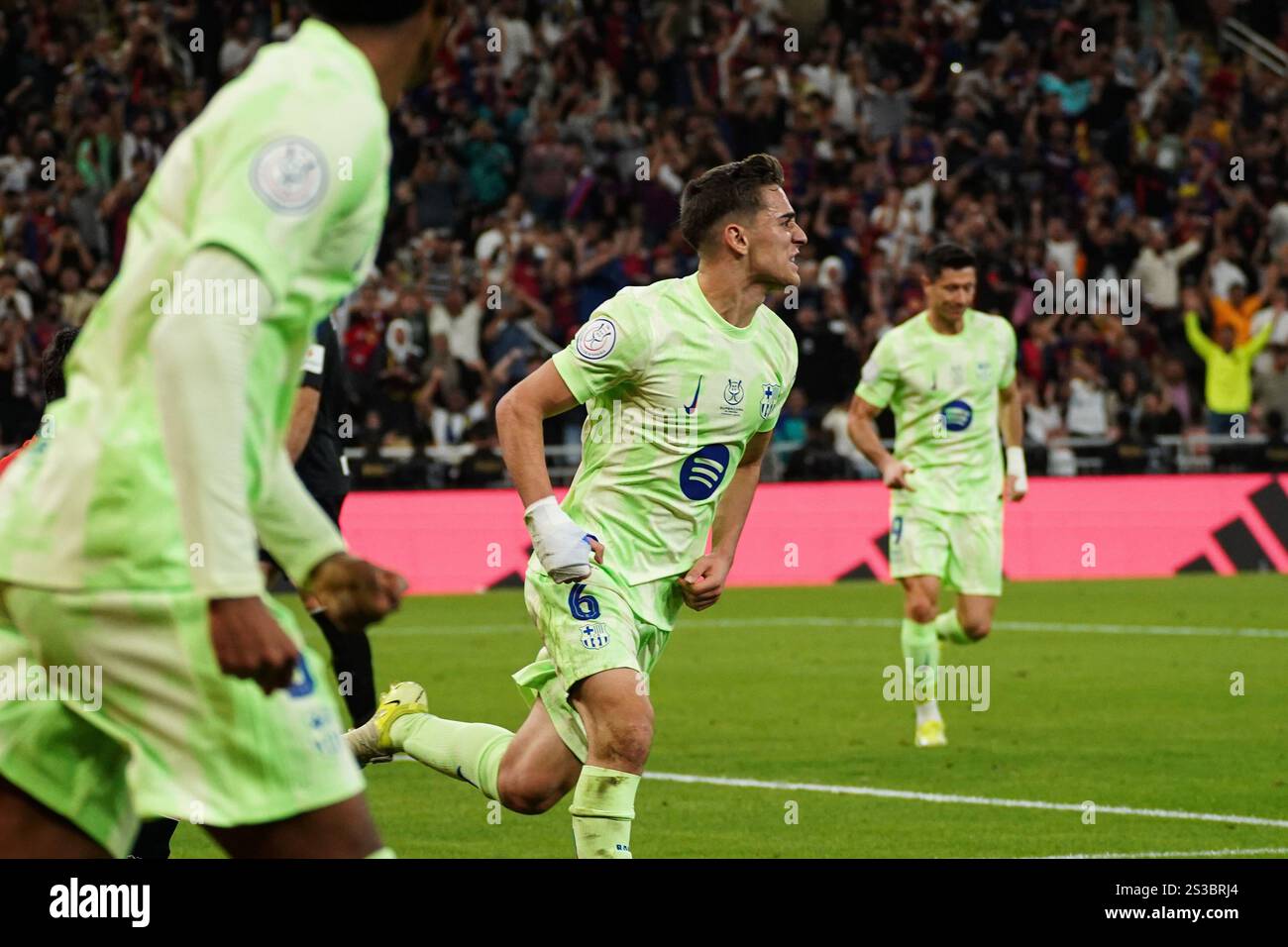 Jeddah, Saudi Arabia. 08th Jan, 2025. FC Barcelona's Pablo Gavi (C ...