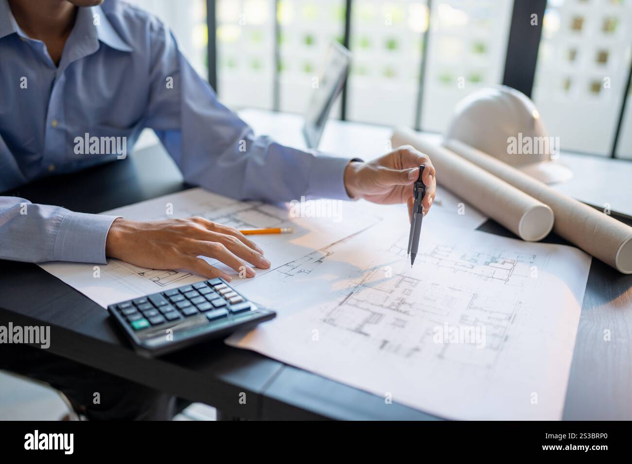 Architecture Man drawing on architectural Creative project business ...