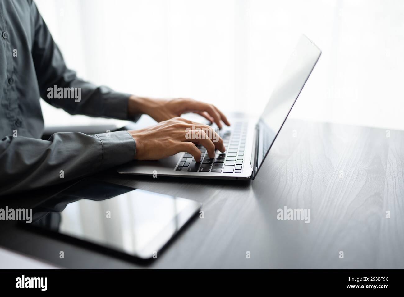 Business man working with laptop Hands typing keyboard. Professional ...