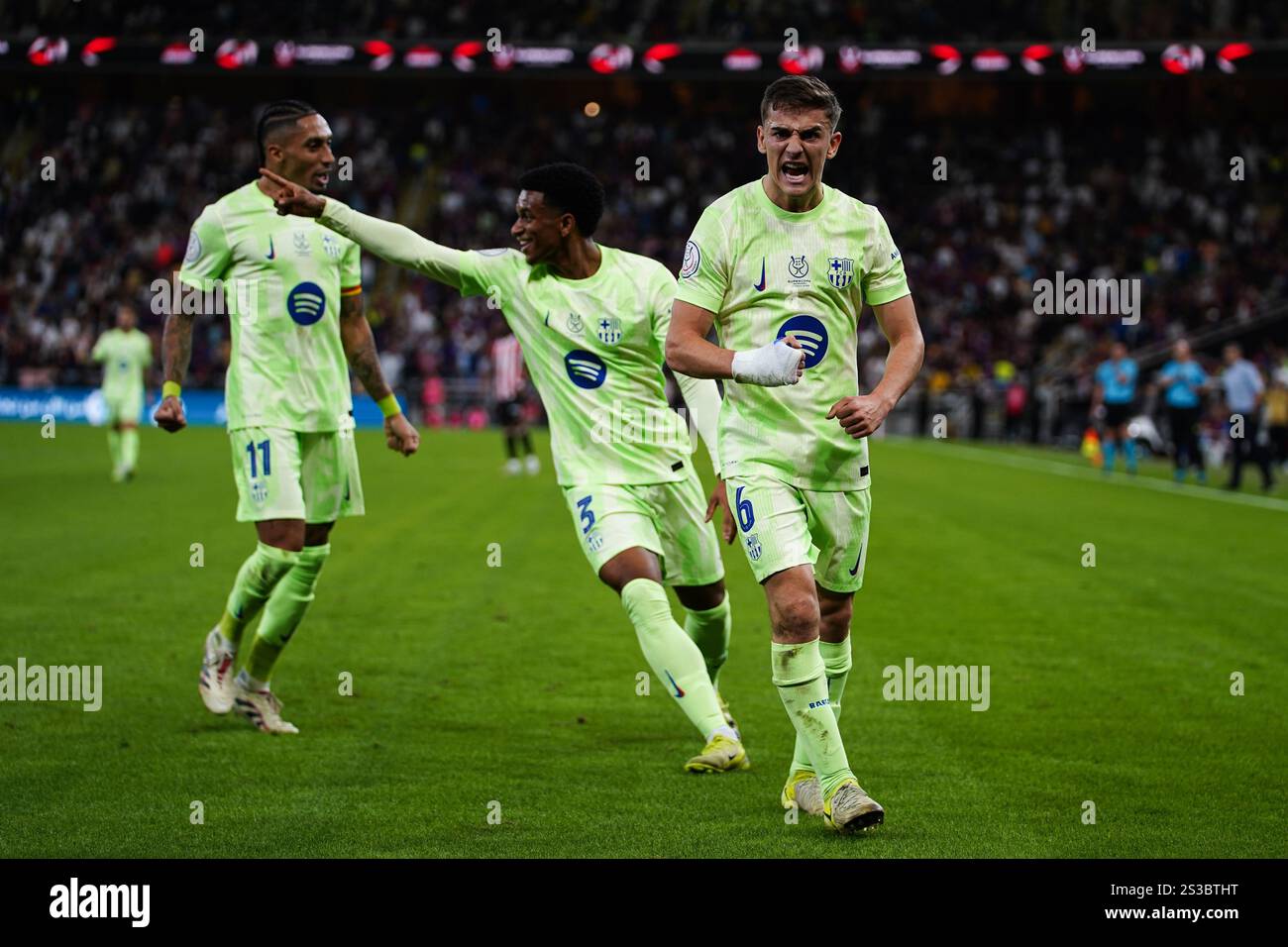 Jeddah, Saudi Arabia. 08th Jan, 2025. FC Barcelona's Pablo Gavi (R ...