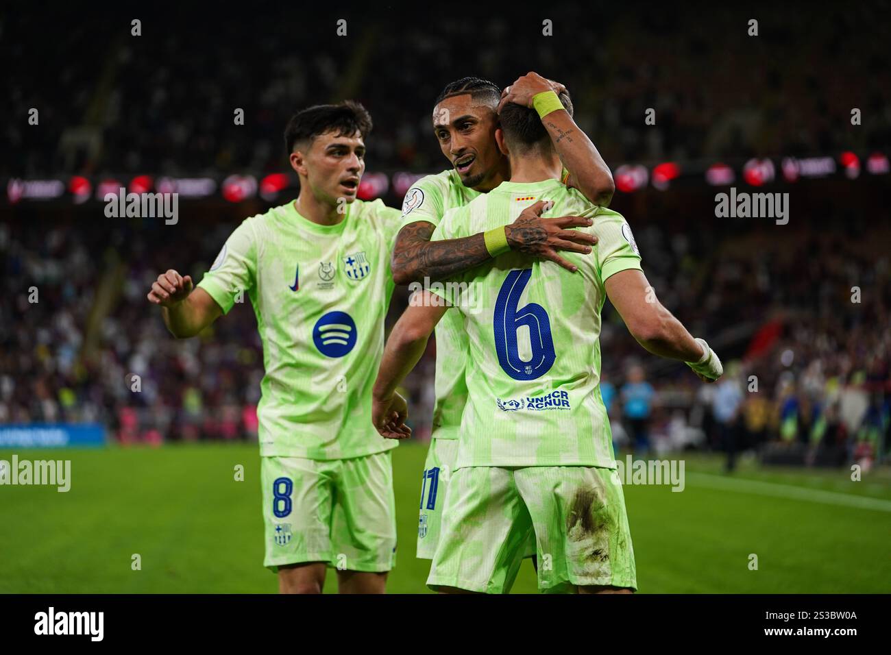 Jeddah, Saudi Arabia. 08th Jan, 2025. FC Barcelona's Pablo Gavi (C ...