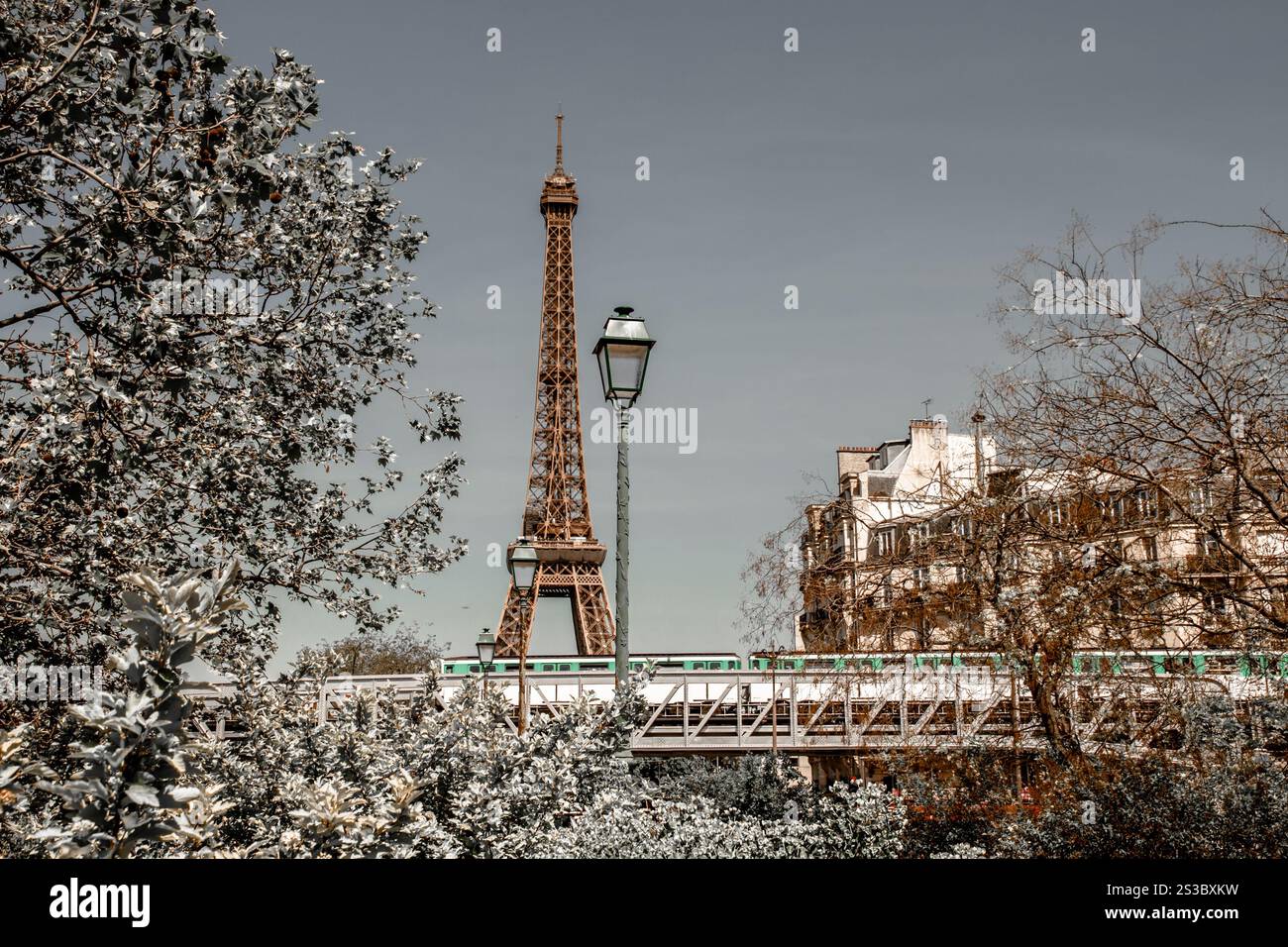 Eiffel Tower and subway on a bridge in Paris, France. Eiffel Tower and ...