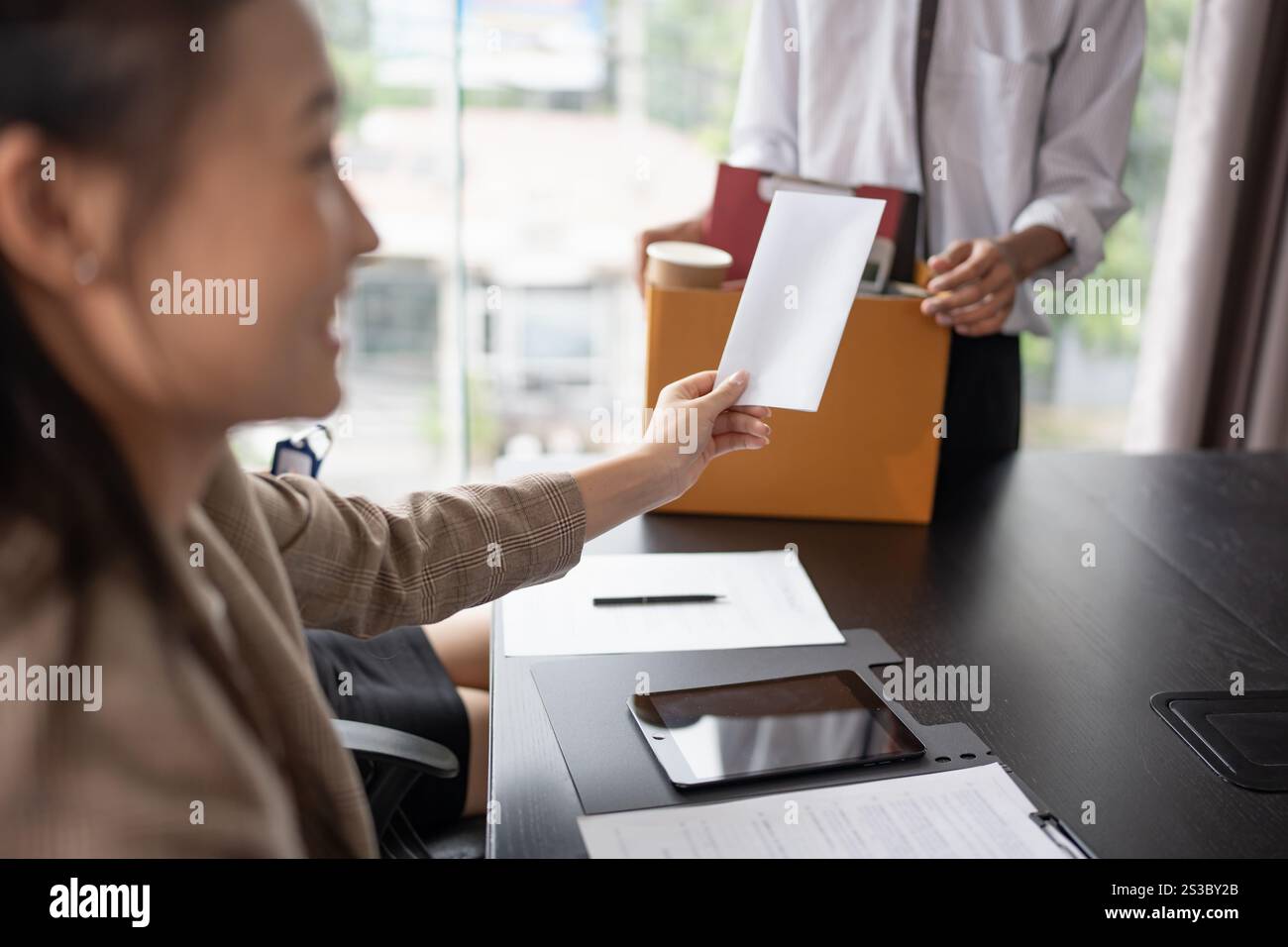 Business man sending resignation letter to boss and Holding Stuff ...