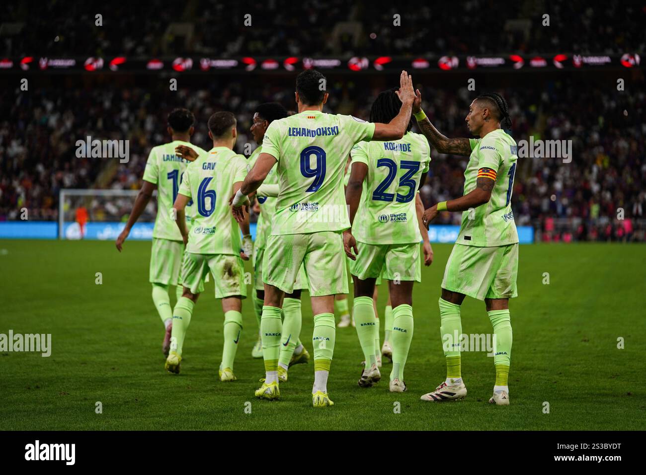 Jeddah, Saudi Arabia. 08th Jan, 2025. FC Barcelona players celebrate ...