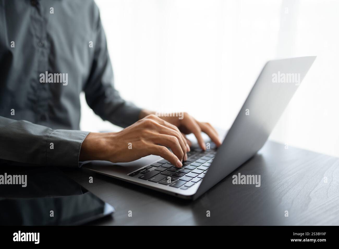 Business man working with laptop Hands typing keyboard. Professional ...