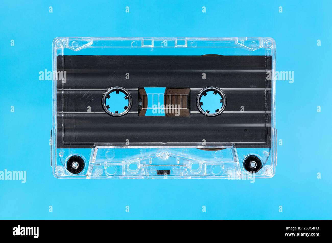Blank Vintage audio cassette isolated on blue background. Template mock ...