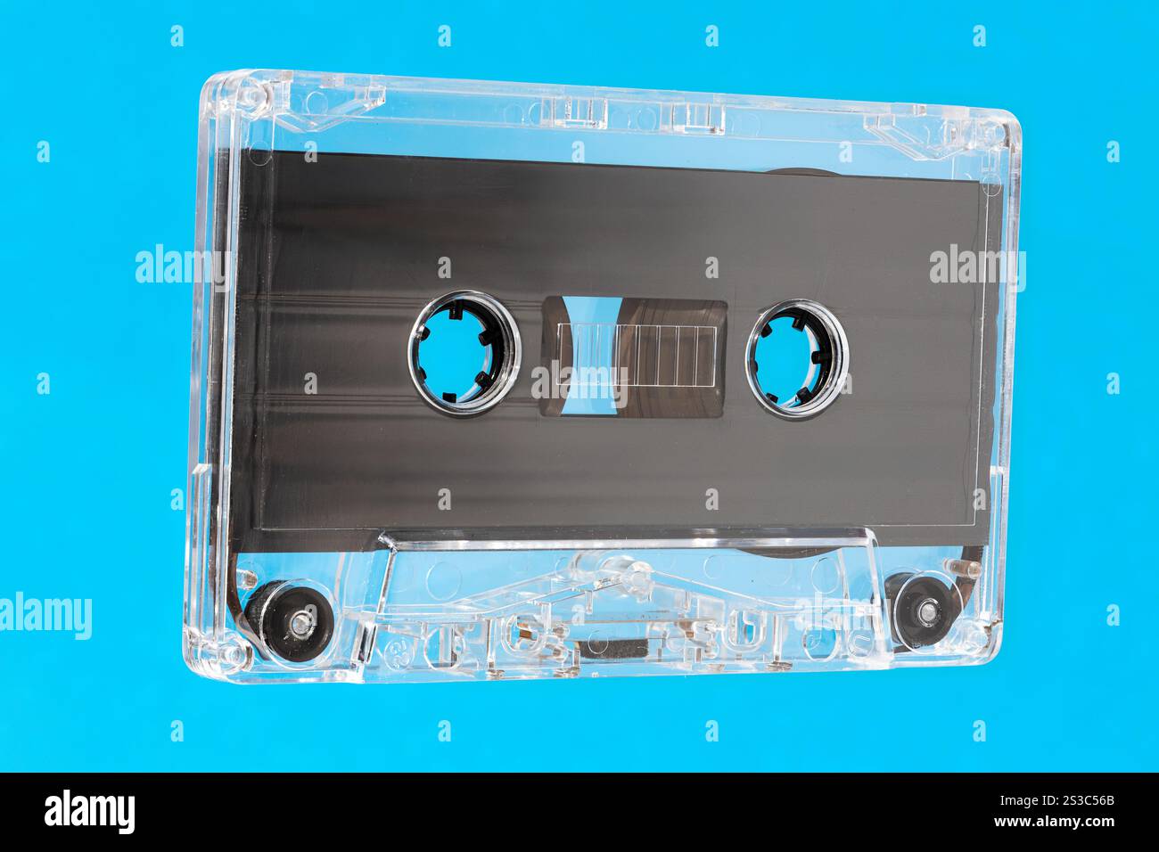 Blank Vintage audio cassette isolated on blue background. Template mock ...