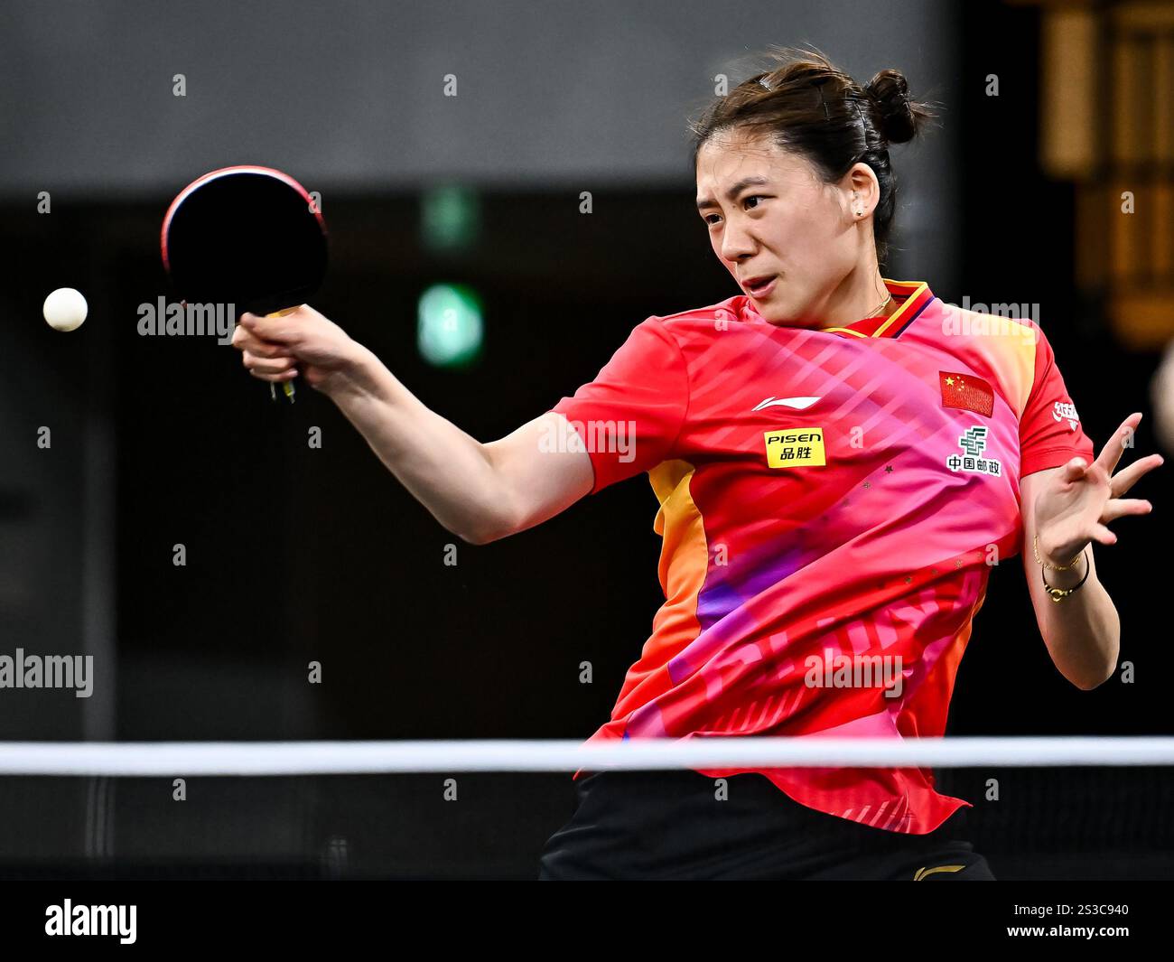 Doha, Qatar. 9th Jan, 2025. Chen Yi of China hits a return during the ...
