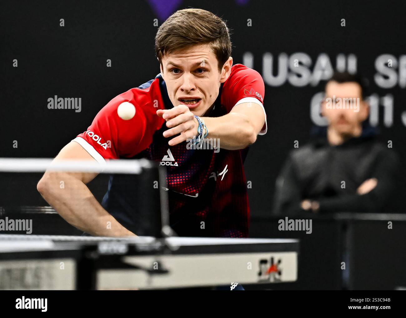 Doha, Qatar. 9th Jan, 2025. Tomas Polansky of the Czech Republic hits a ...
