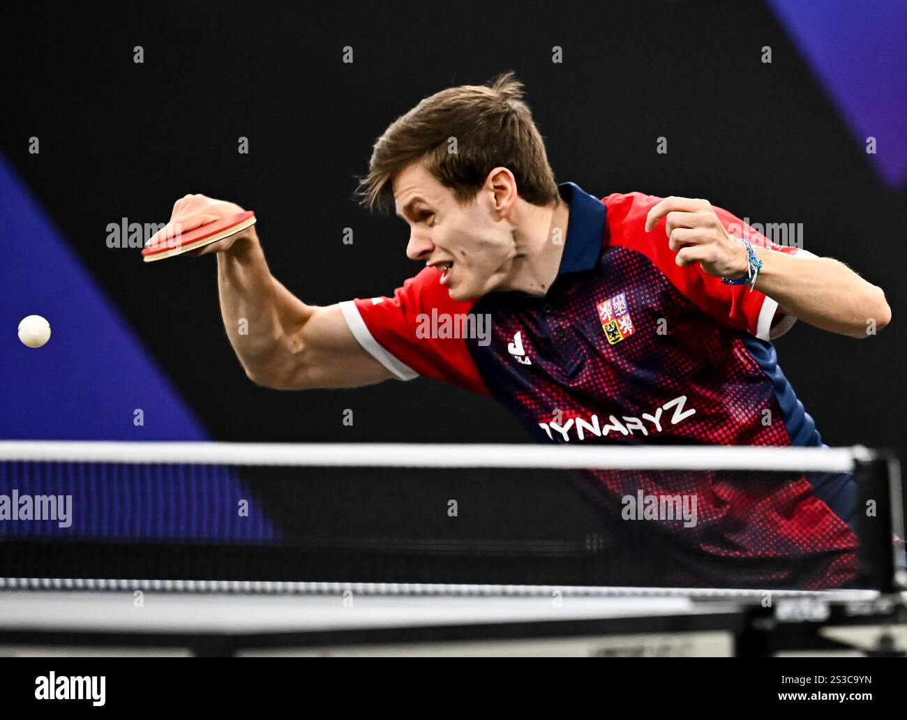 Doha, Qatar. 9th Jan, 2025. Tomas Polansky of the Czech Republic hits a ...
