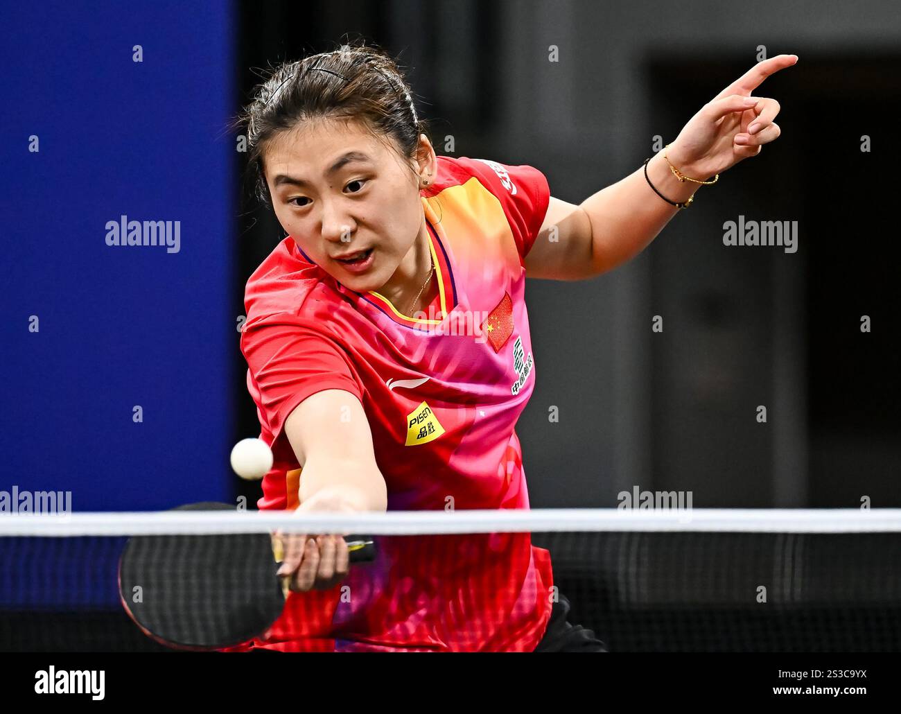 Doha, Qatar. 9th Jan, 2025. Chen Yi of China hits a return during the ...