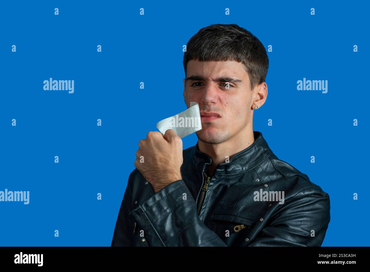Man pulling tape from hi-res stock photography and images - Alamy