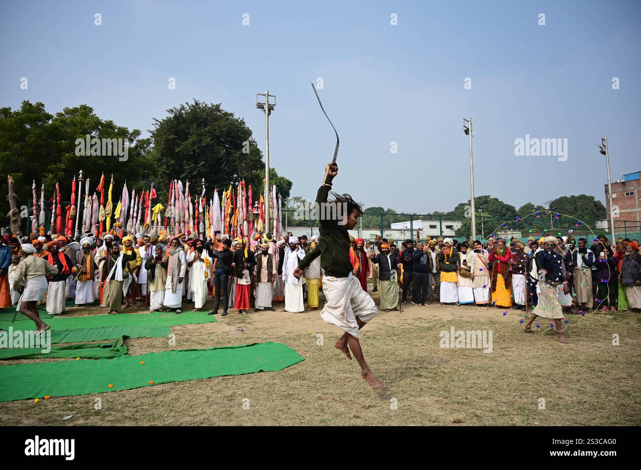 Prayagraj, India. 08th Jan, 2025. Sadhus showing their skill during ...