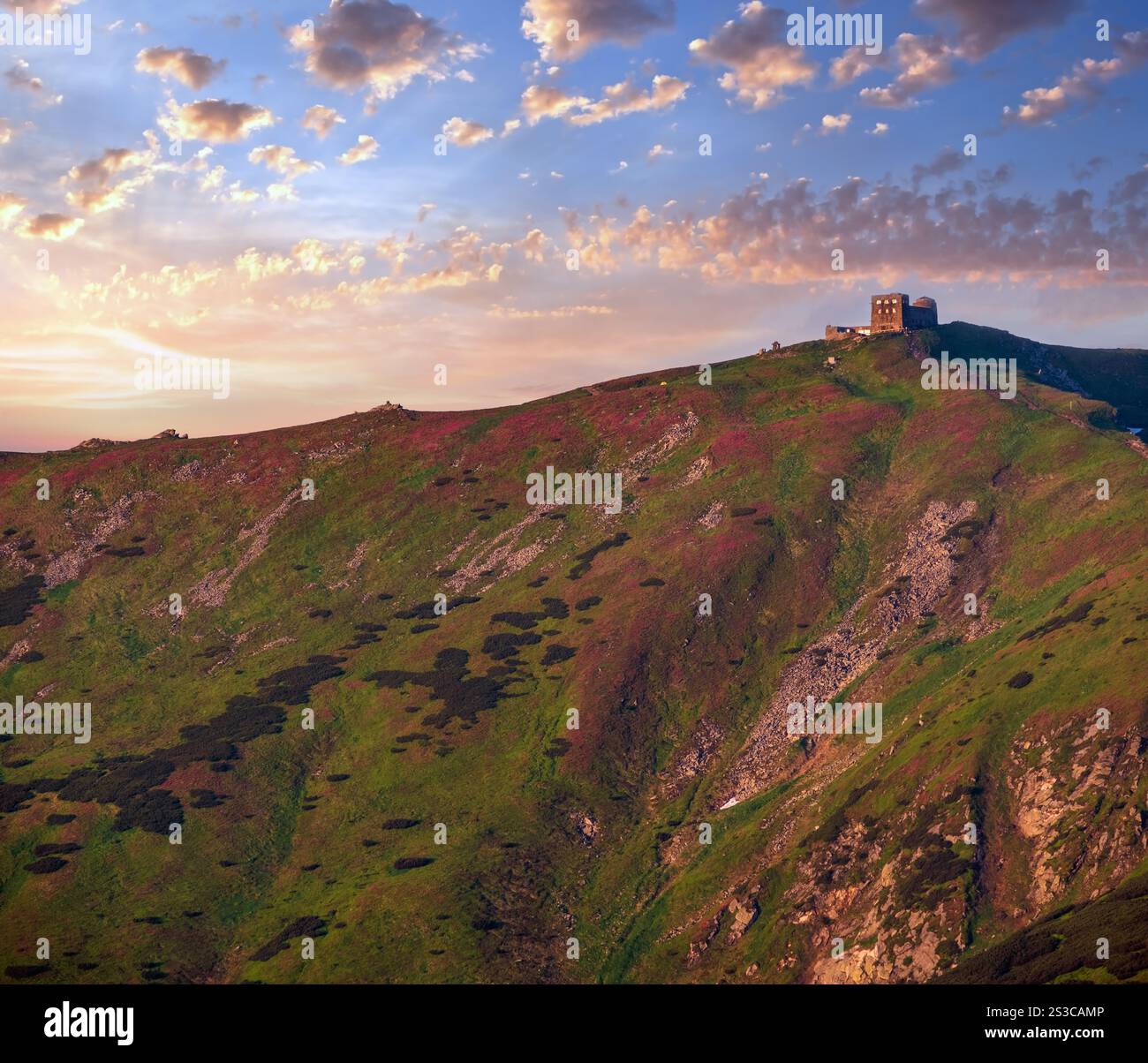 Massif of Pip Ivan with the ruins of the observatory on top. Pink ...