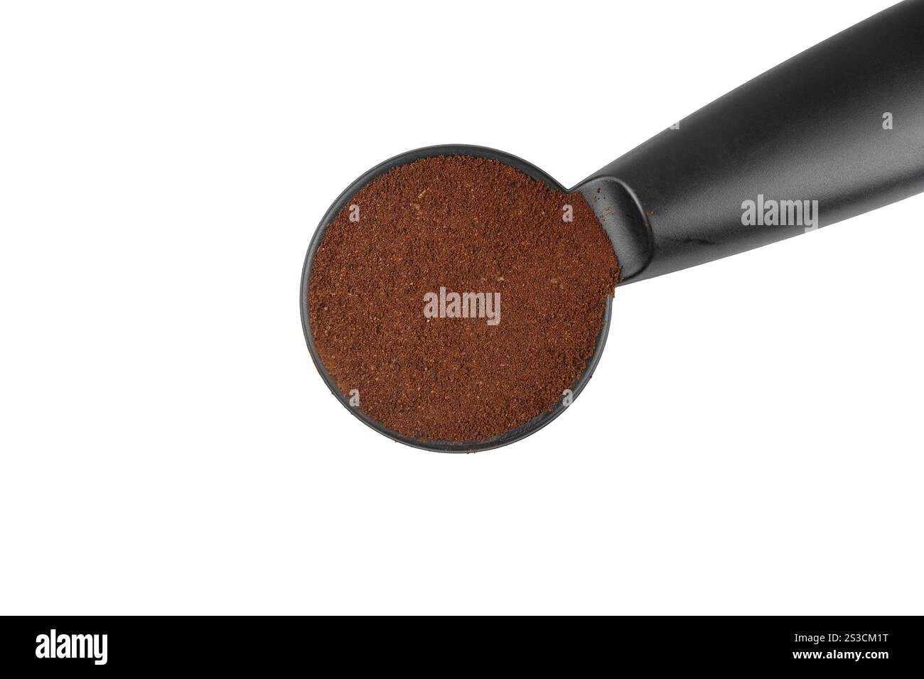 Black plastic espresso coffee tamper with ground coffee isolated over ...