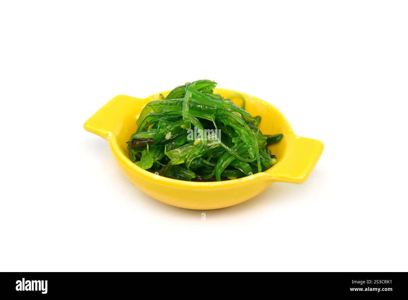 Heap of organic Japanese Wakame salad isolated on white background ...