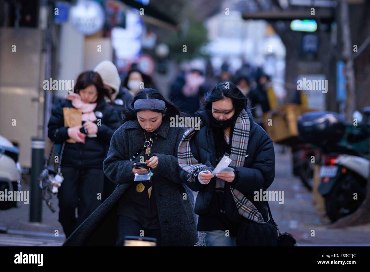 Seoul, South Korea. 9th Jan, 2025. People walk on a street in Seoul ...