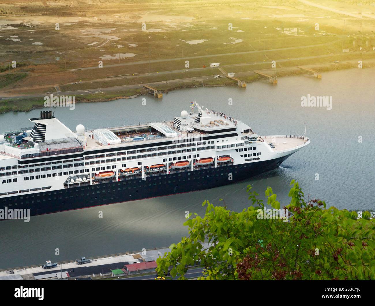 Aerial view of a large cruise ship passing through the Panama Canal ...