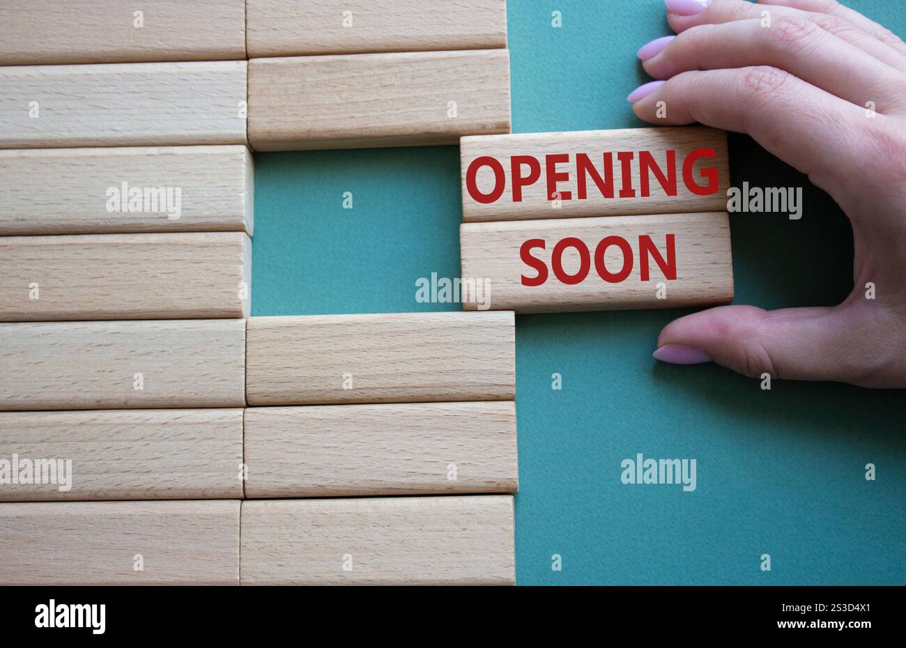 Opening soon symbol. Concept word Opening soon on wooden blocks ...