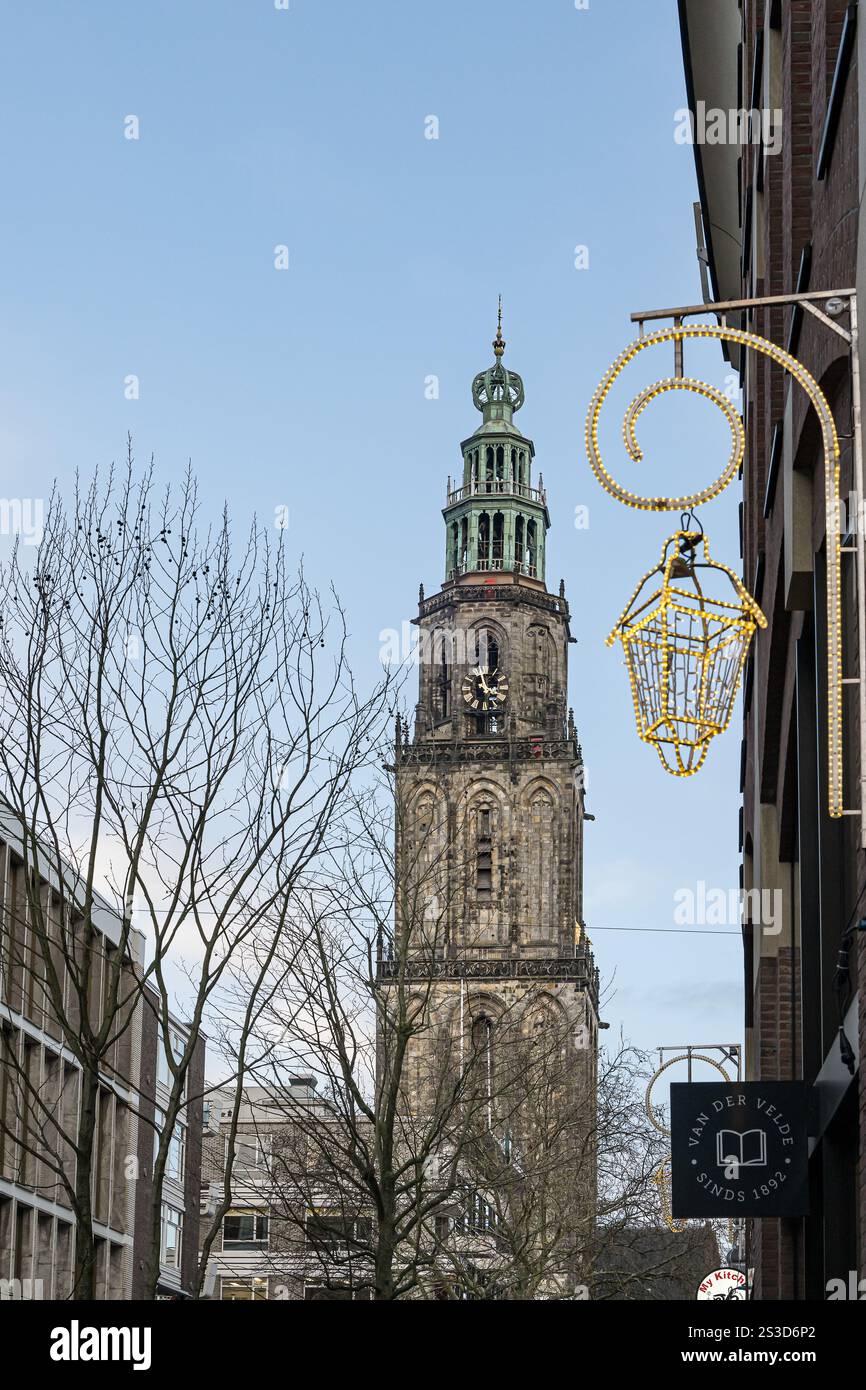 GRONINGEN - The Martinitoren, the figurehead of the city in the street ...