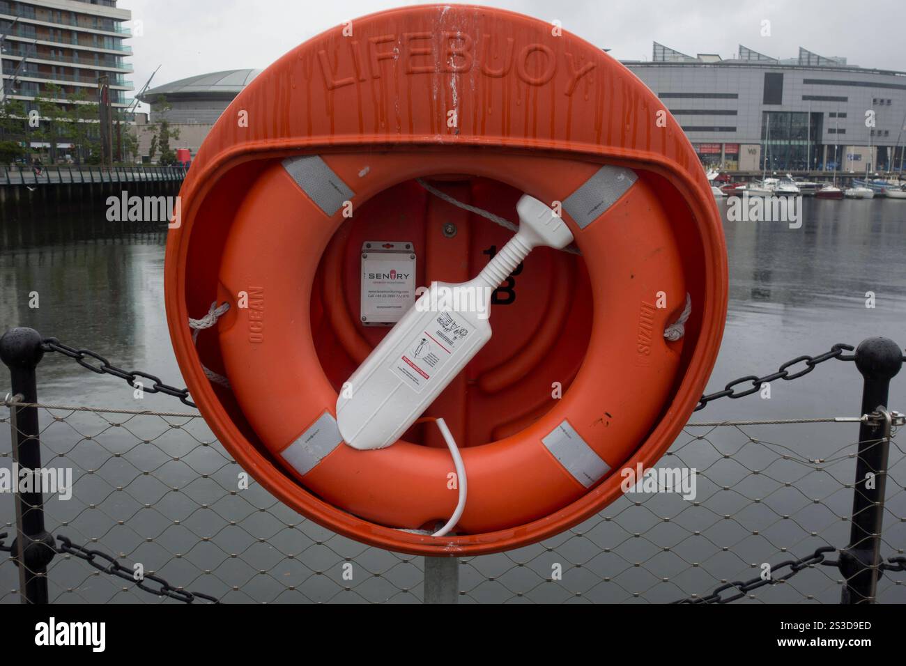 life belt with warning sign on risks and hazards in seafaring and ...