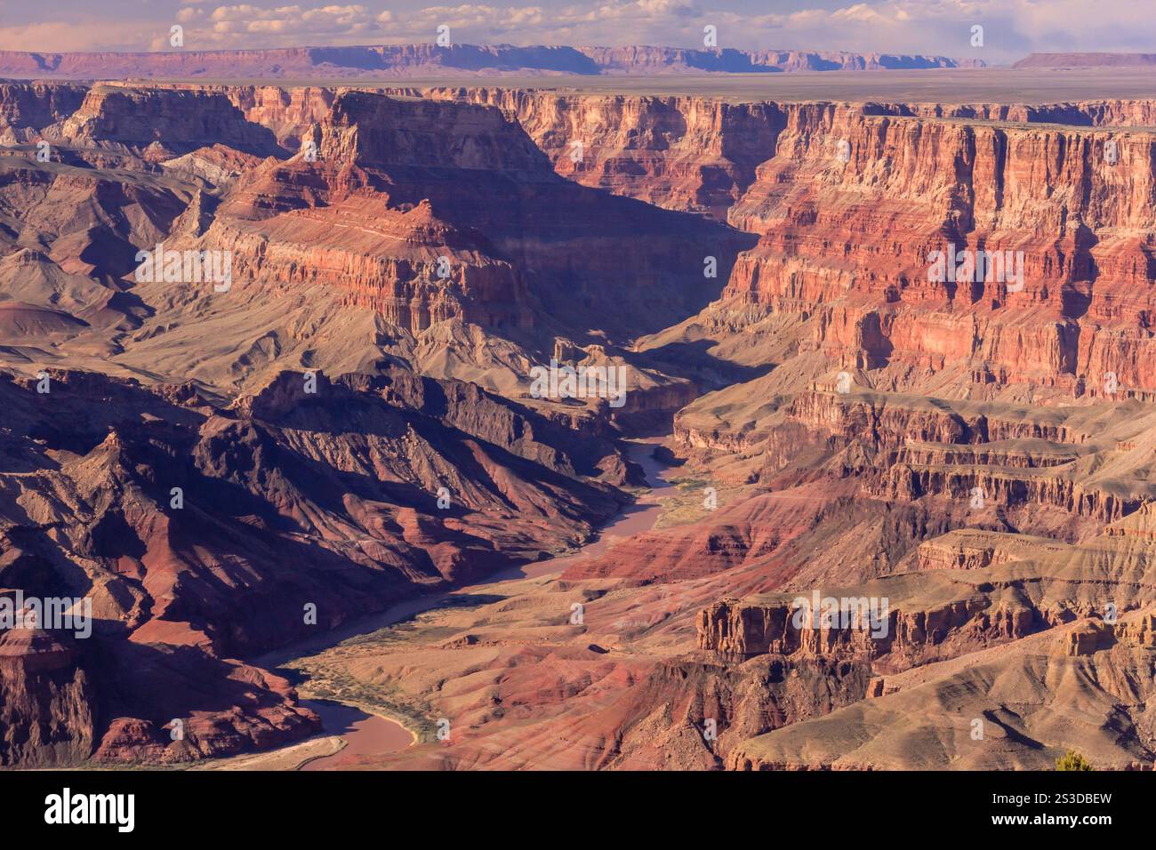 The Grand Canyon is a beautiful and vast landscape with a river running ...