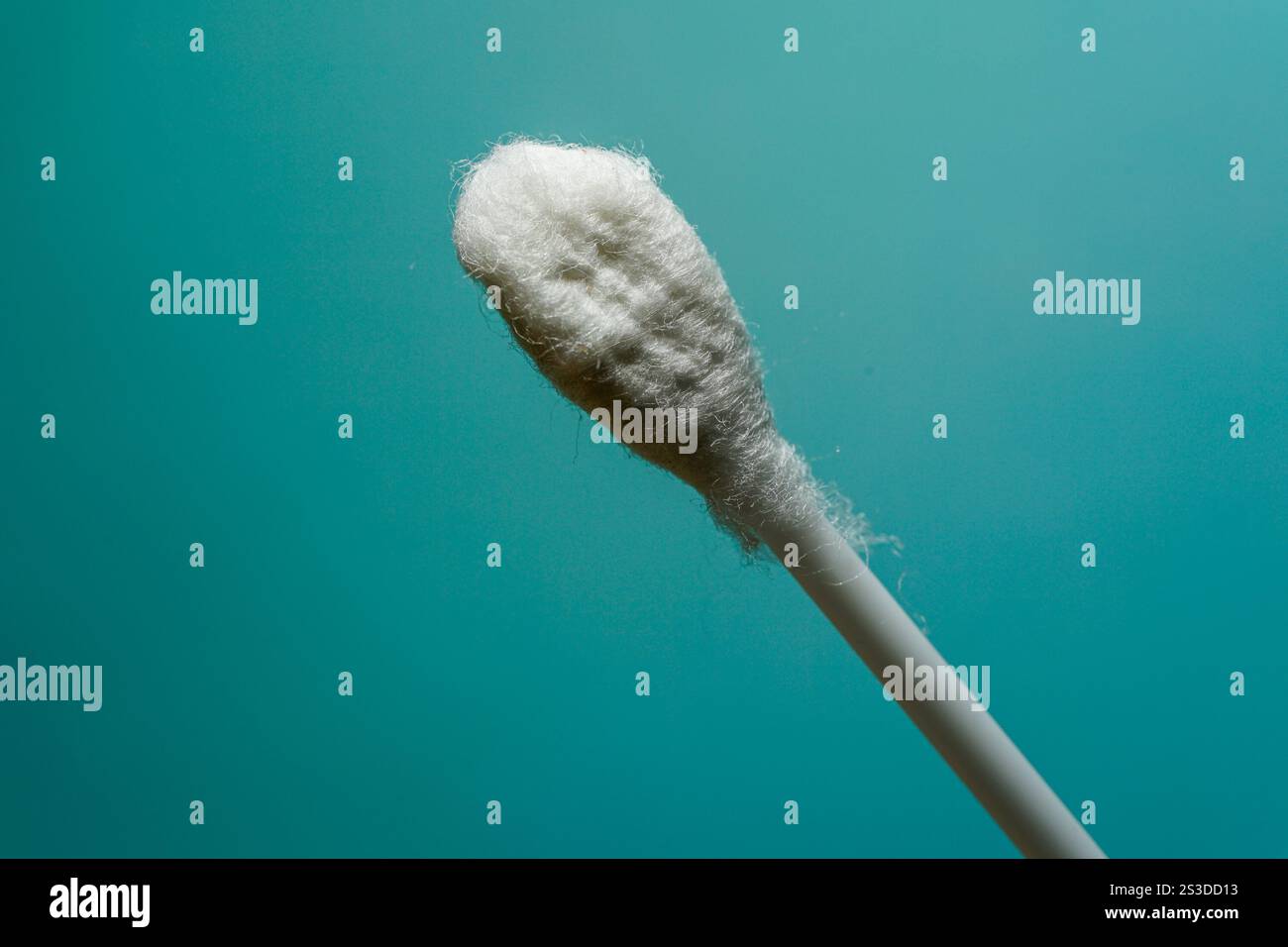 macro close up photo of a single cotton ear hygiene swab isolated with ...