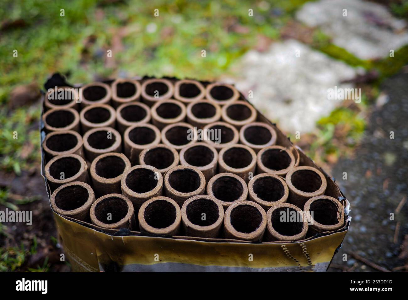 Burnt firecracker leftover after new year eve outdoor in Germany Stock ...