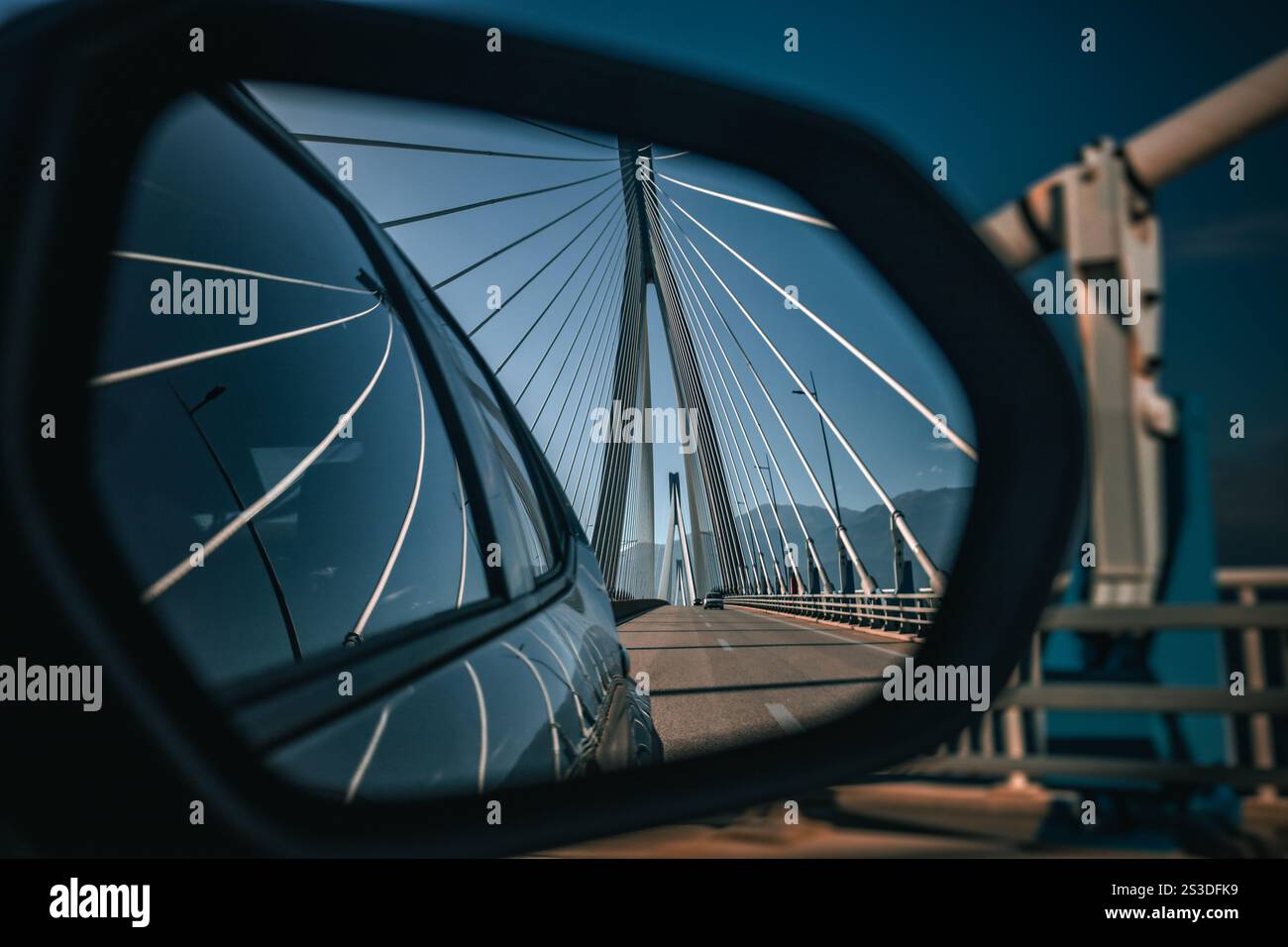 The Rion-Antirion Bridge in Greece, reflected in a car's side mirror ...