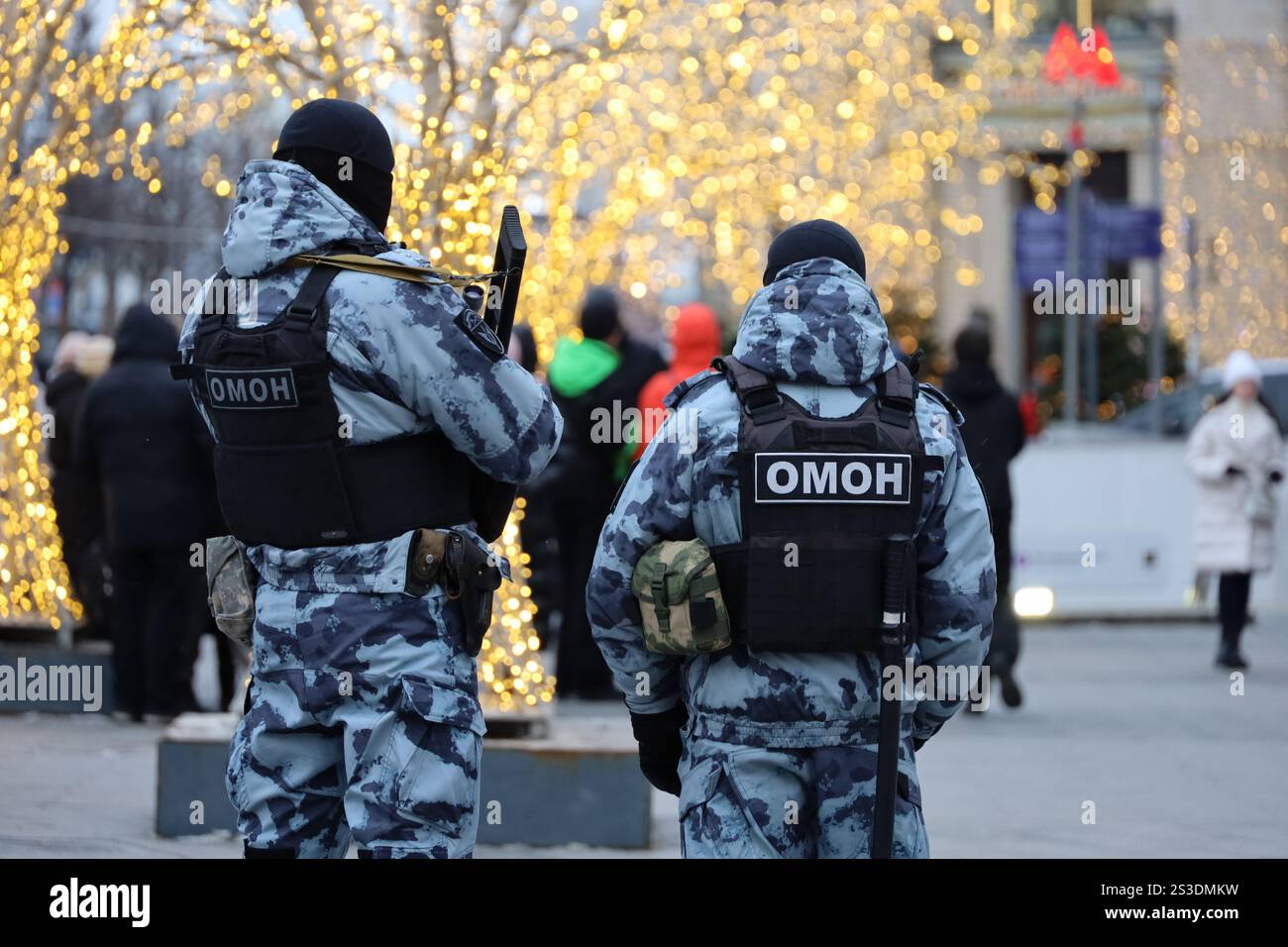 Russian police officers patrol the street on winter city and New Year ...