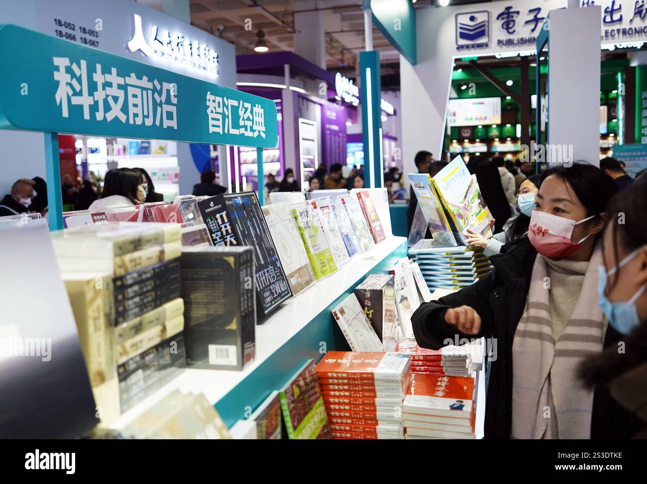 Beijing, China. 9th Jan, 2025. People visit the 2025 Beijing Book Fair ...