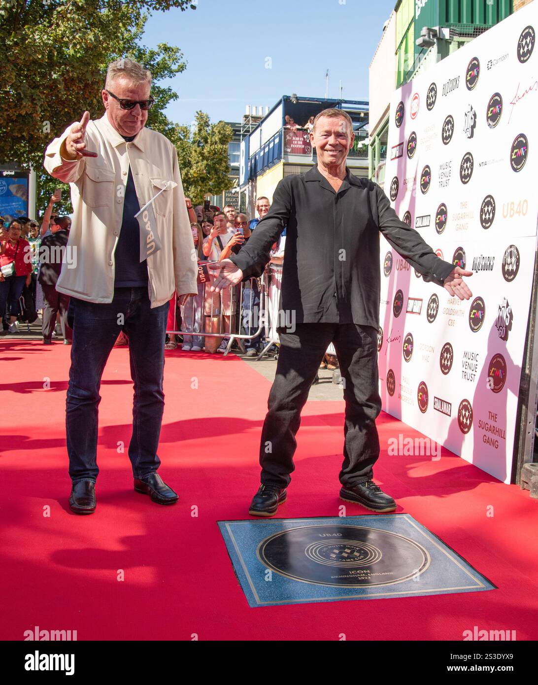 Suggs and Ali Campbell during UB40's Music Walk of Fame plaque ...