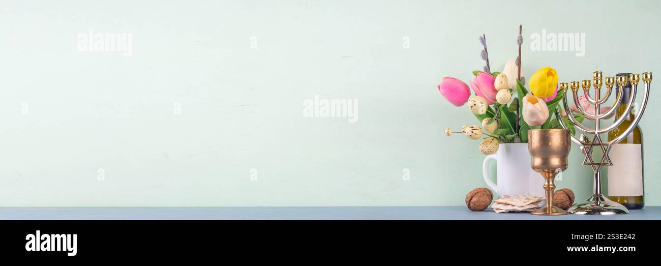 Pesah and Passover Jewish Spring holiday background with spring tulip flowers, decorative Easter ...