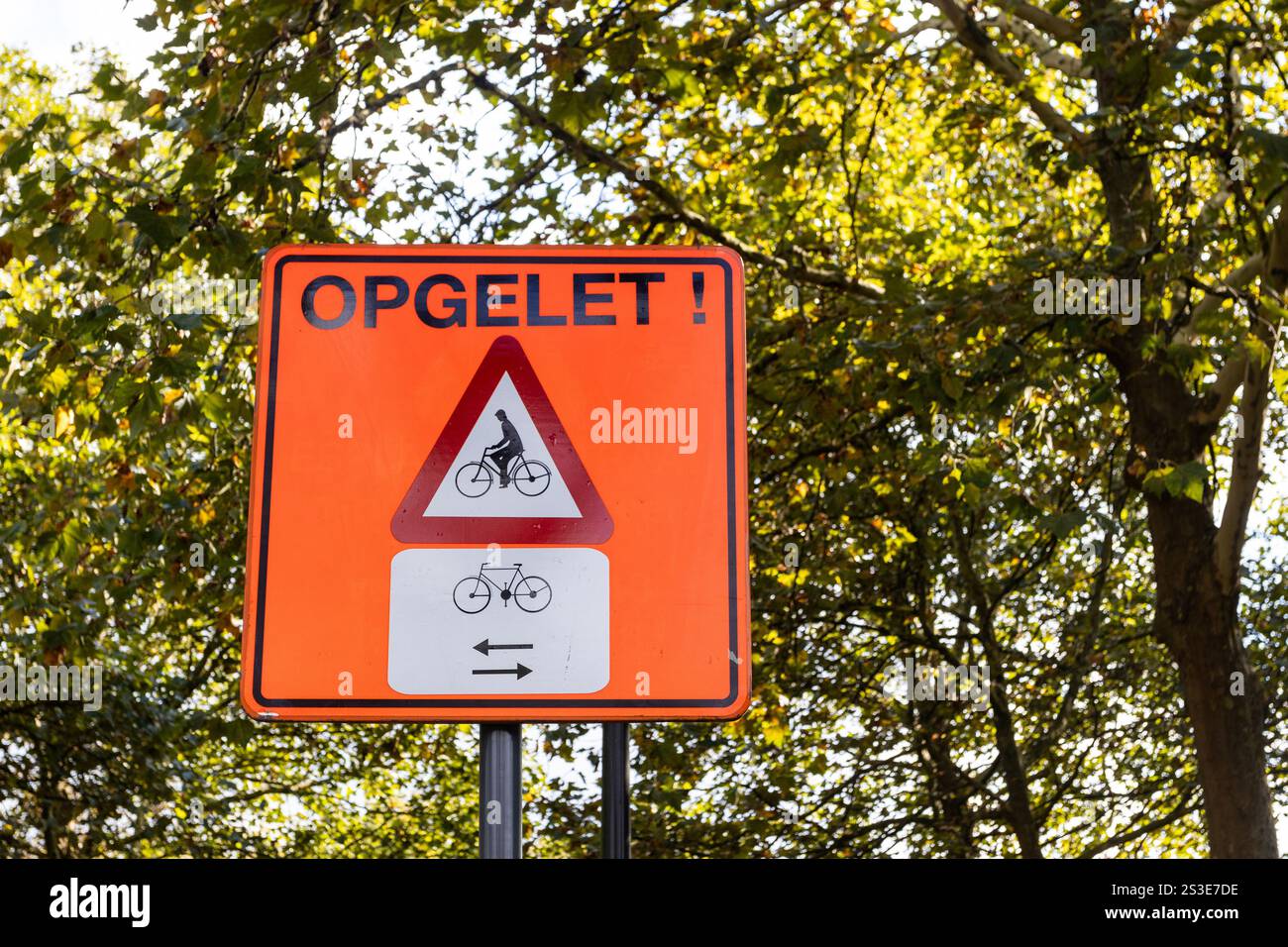Cycle Track warnig signs in Flanders Belgium. Orange warning sign with ...