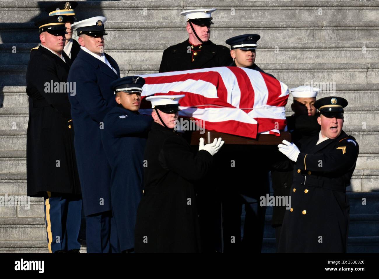 The flag draped casket of former President Jimmy Carter leaves the U.S ...