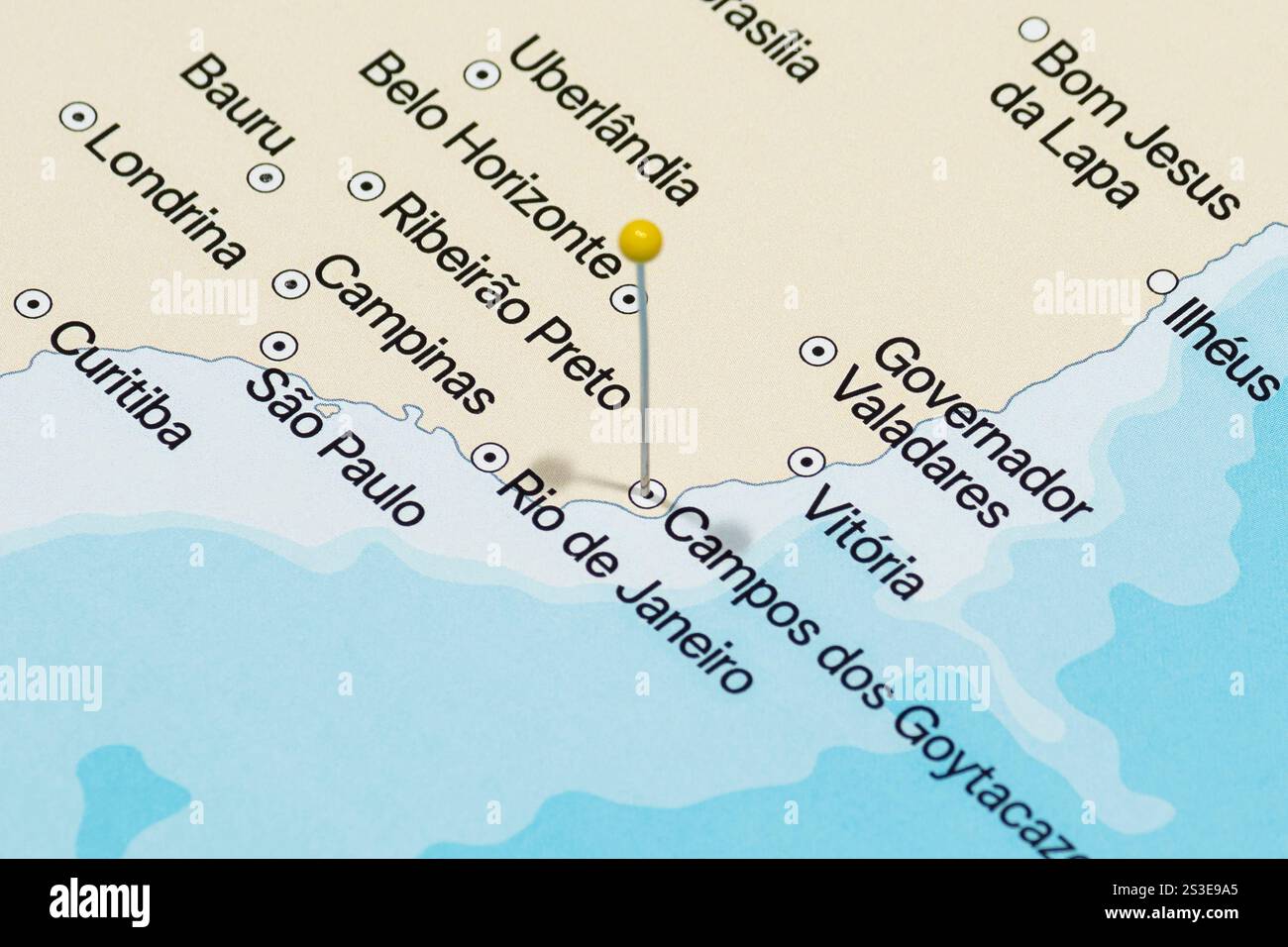 Macro photo of a yellow pin needle into Campos dos Goytacazes city of ...