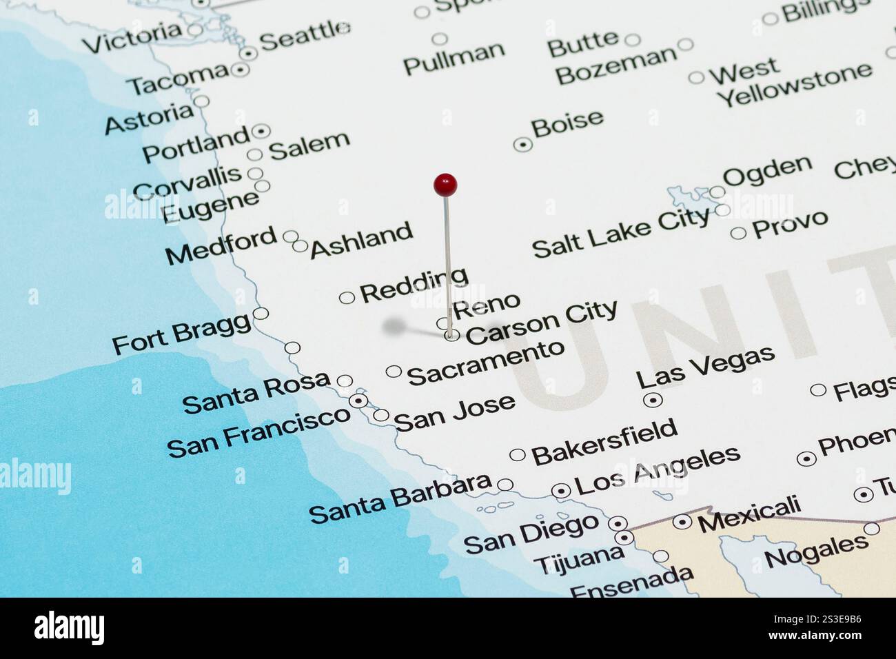 Macro photo of a red pin needle into Carson city of United States of ...