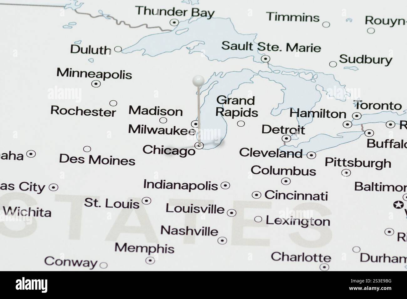 Macro photo of a white pin needle into Chicago city of United States of ...